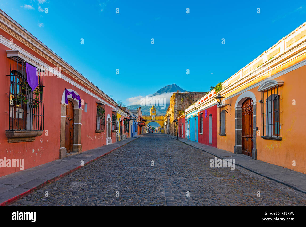 Cityscape of Antigua city at sunrise with its main street, colourful ...