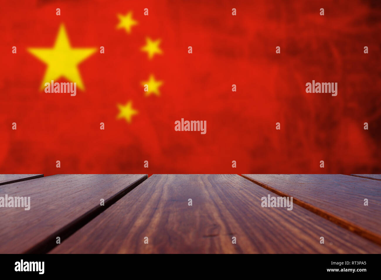 Wood Table Top Background and national flag of China on the grunge ...