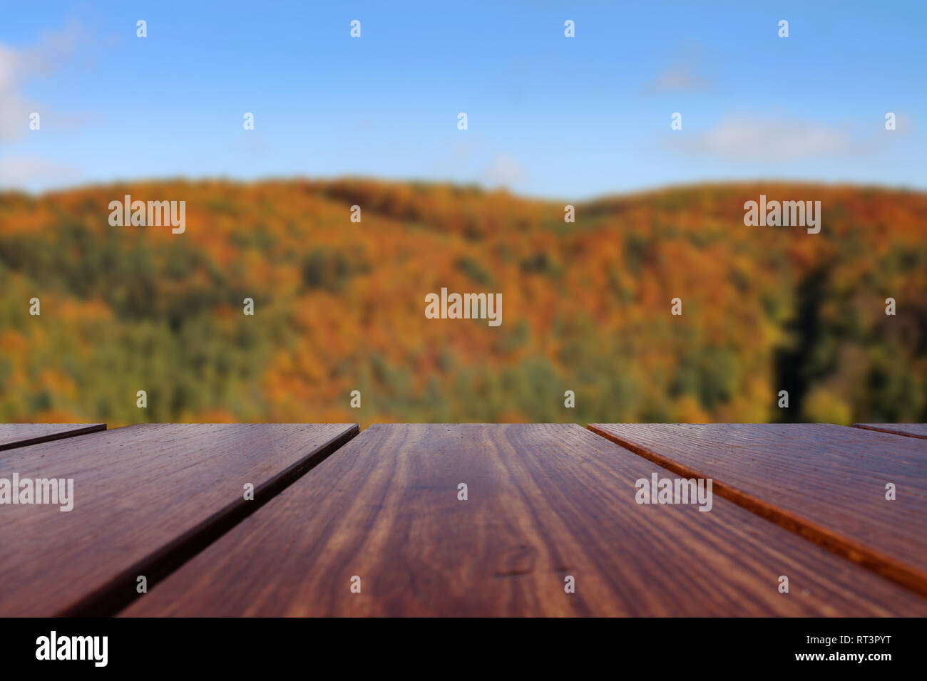Wood Table Top Background and autumn forest background Stock Photo - Alamy