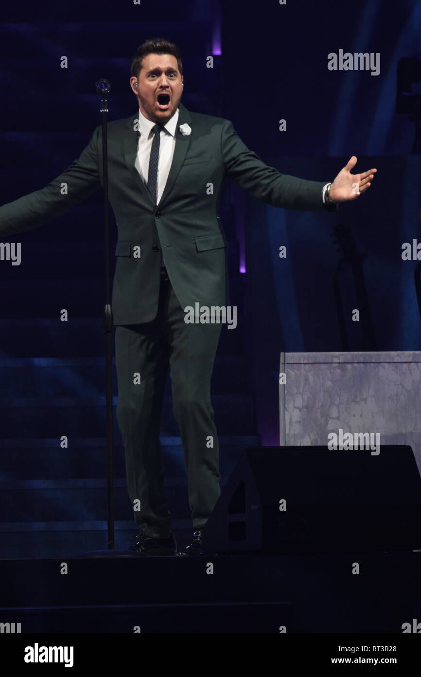 Singer Michael BublŽ is shown performing on stage during a "live ...