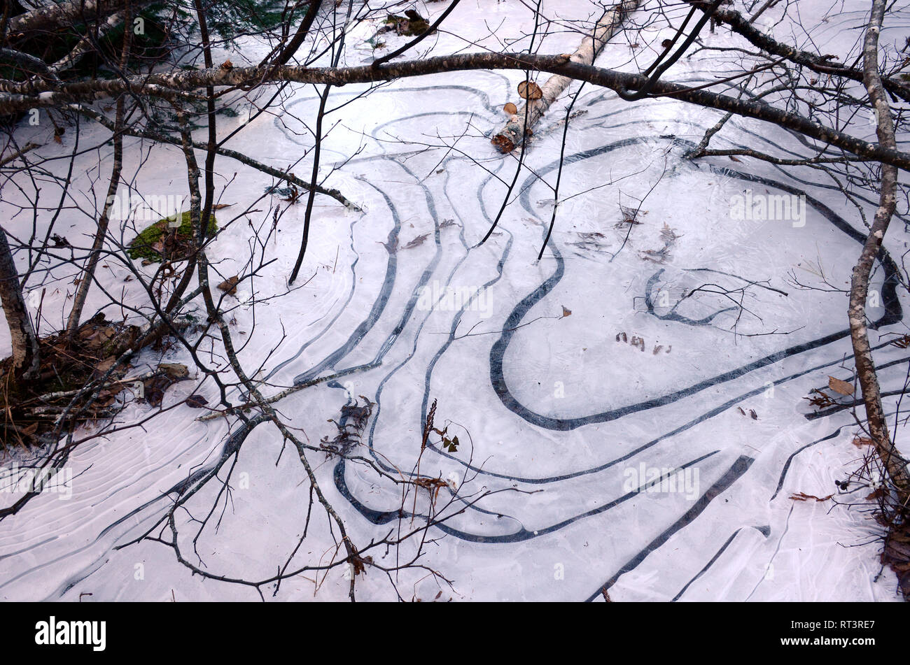 Ice patterns on a lake in Canada Stock Photo - Alamy