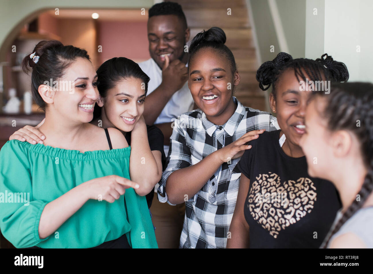 Happy family talking Stock Photo - Alamy