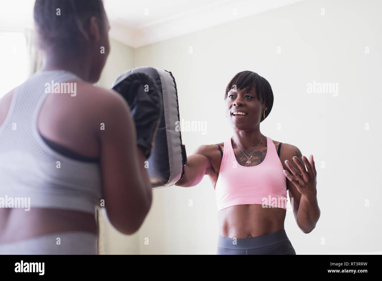 Mother and daughter boxing Stock Photo - Alamy