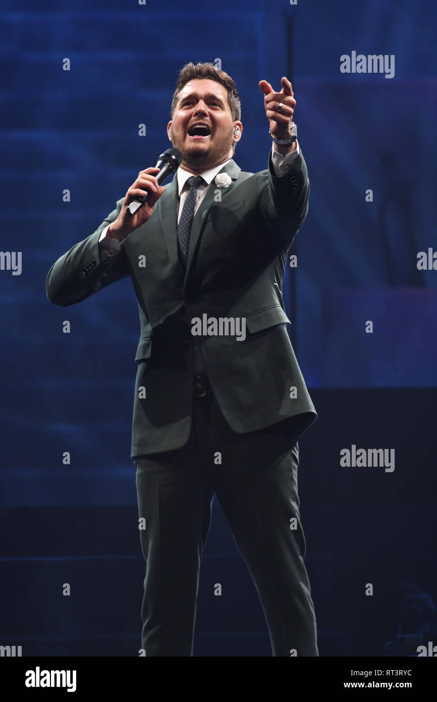 Singer Michael BublŽ is shown performing on stage during a "live ...