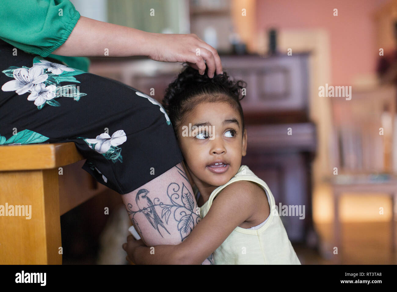 Girl hugging mothers leg hi-res stock photography and images - Alamy