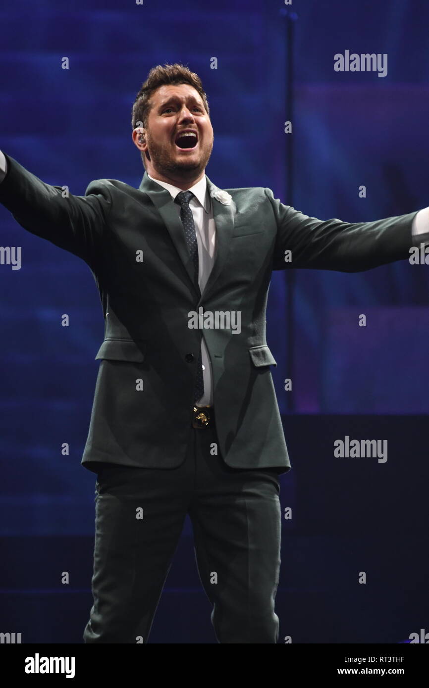 Singer Michael BublŽ is shown performing on stage during a "live ...