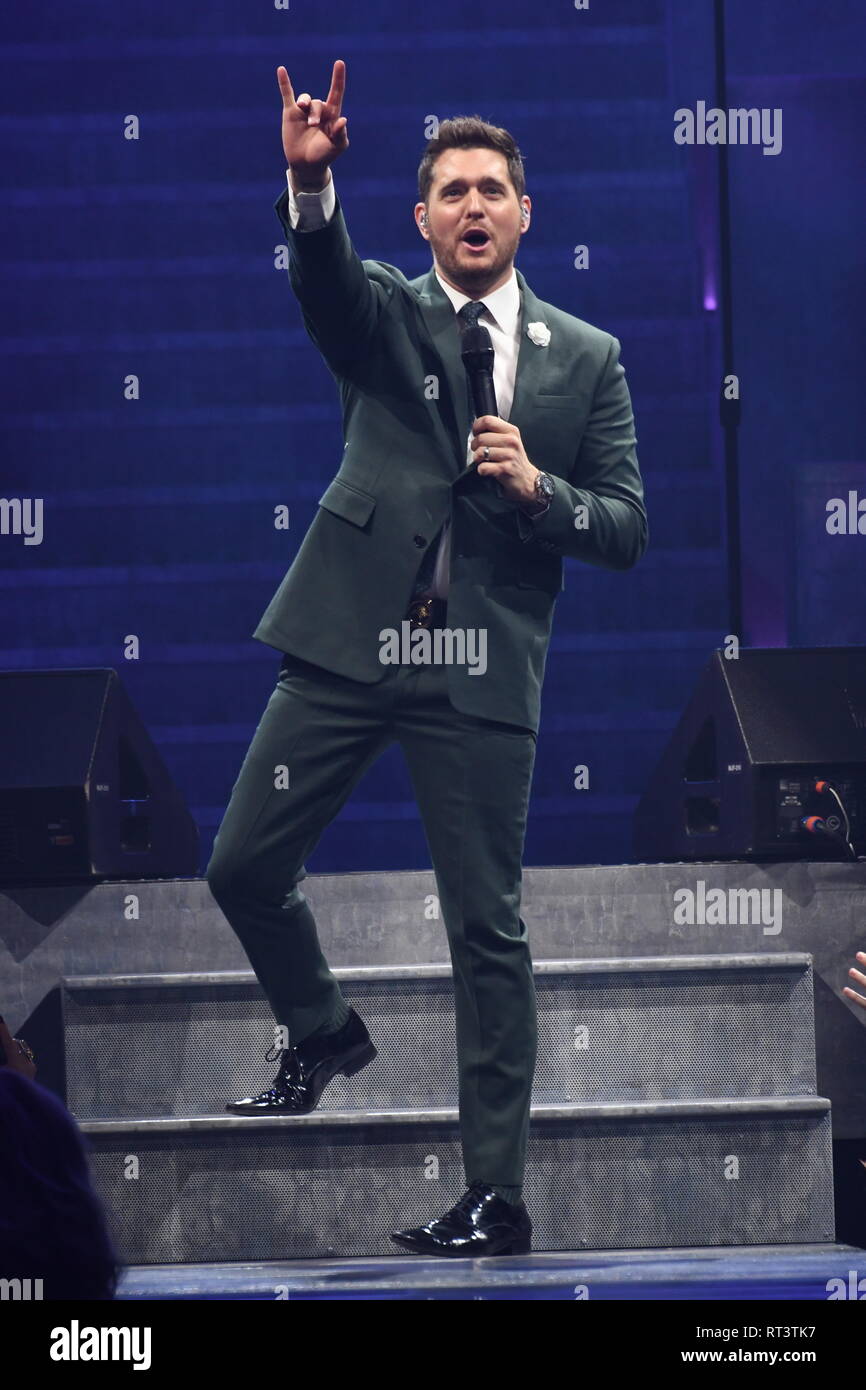 Singer Michael BublŽ is shown performing on stage during a "live ...