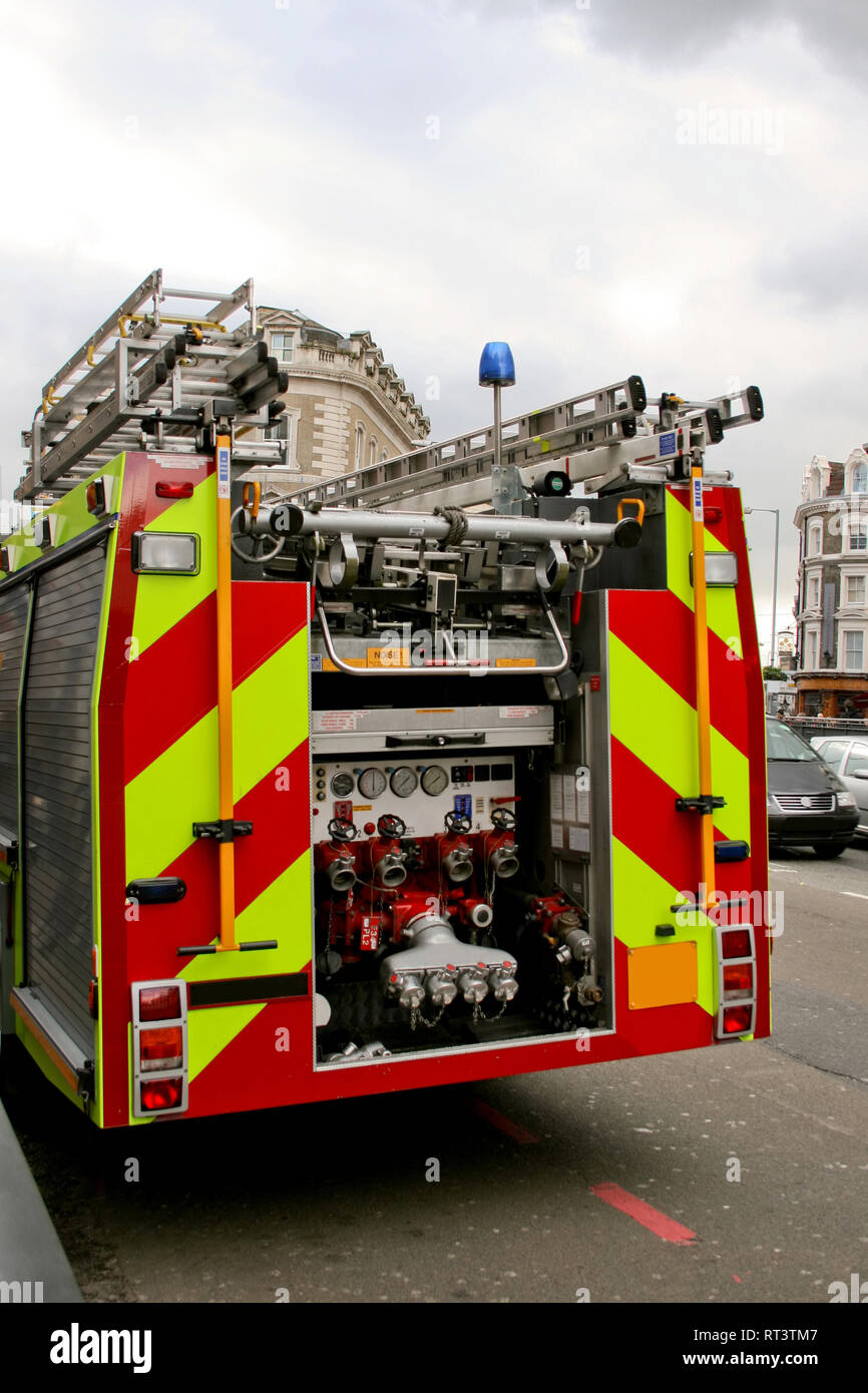 Fire truck engine in action from behind Stock Photo - Alamy