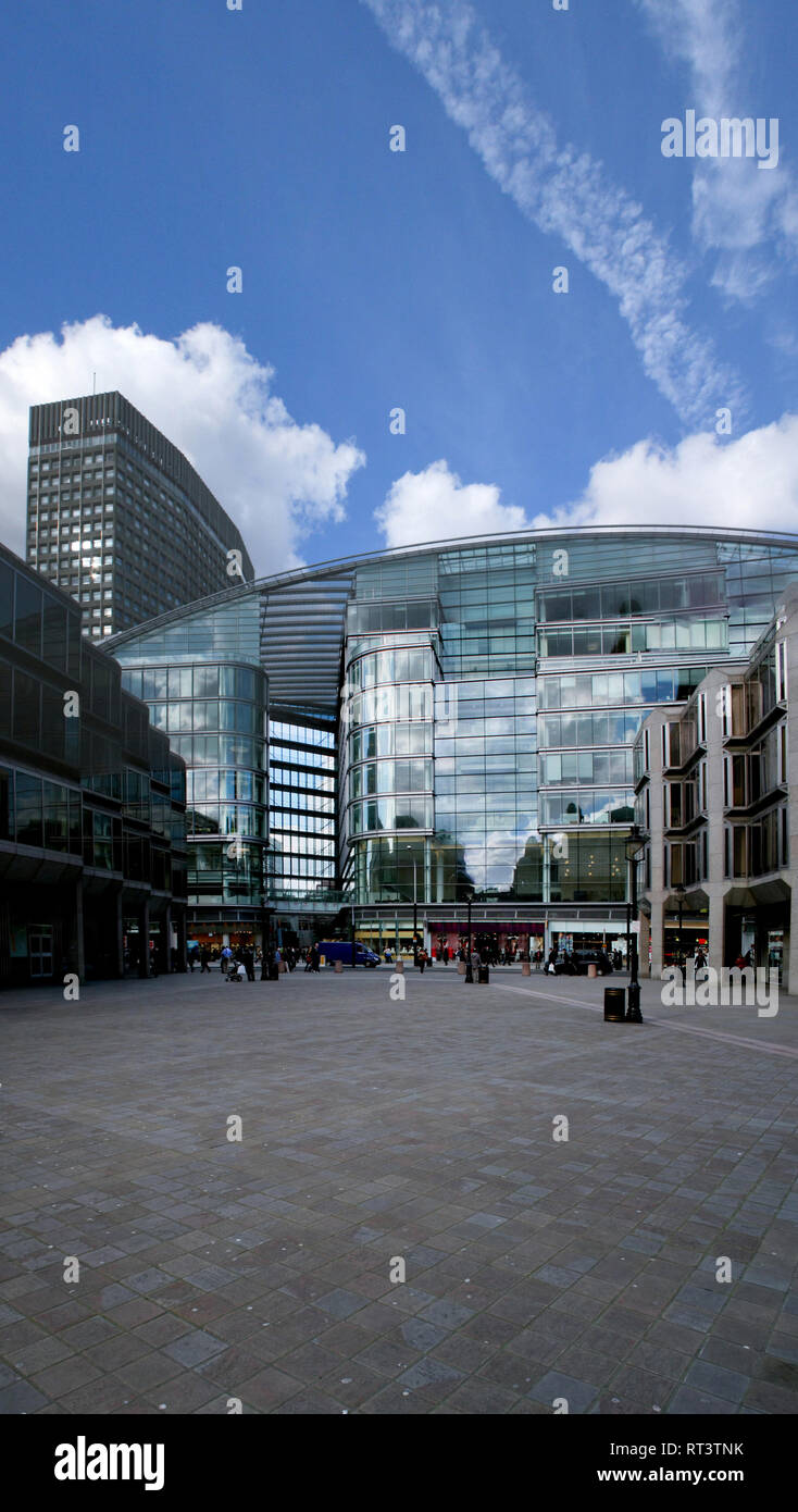 Blue glass business building with big arch Stock Photo - Alamy
