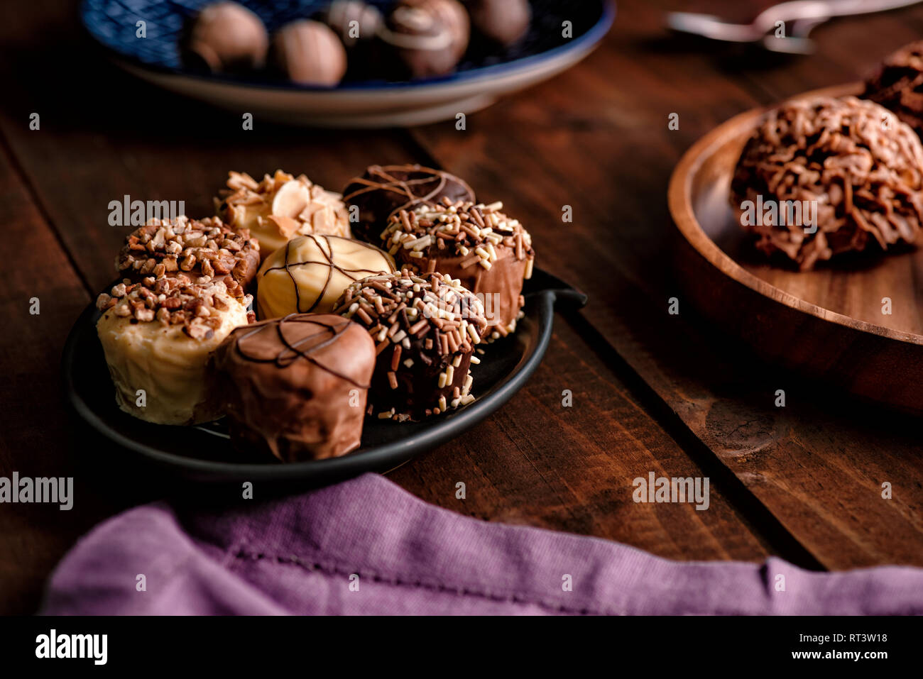 Chocolates in trays on table Stock Photo - Alamy