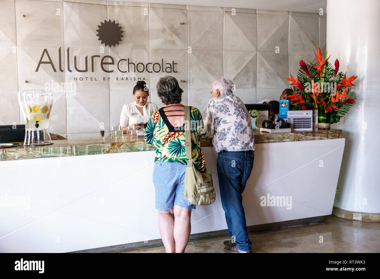 Male clerk at a reception counter hi-res stock photography and images ...
