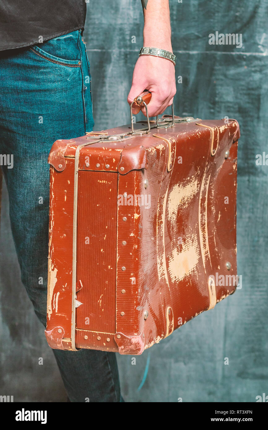 Man carries suitcase hi-res stock photography and images - Alamy