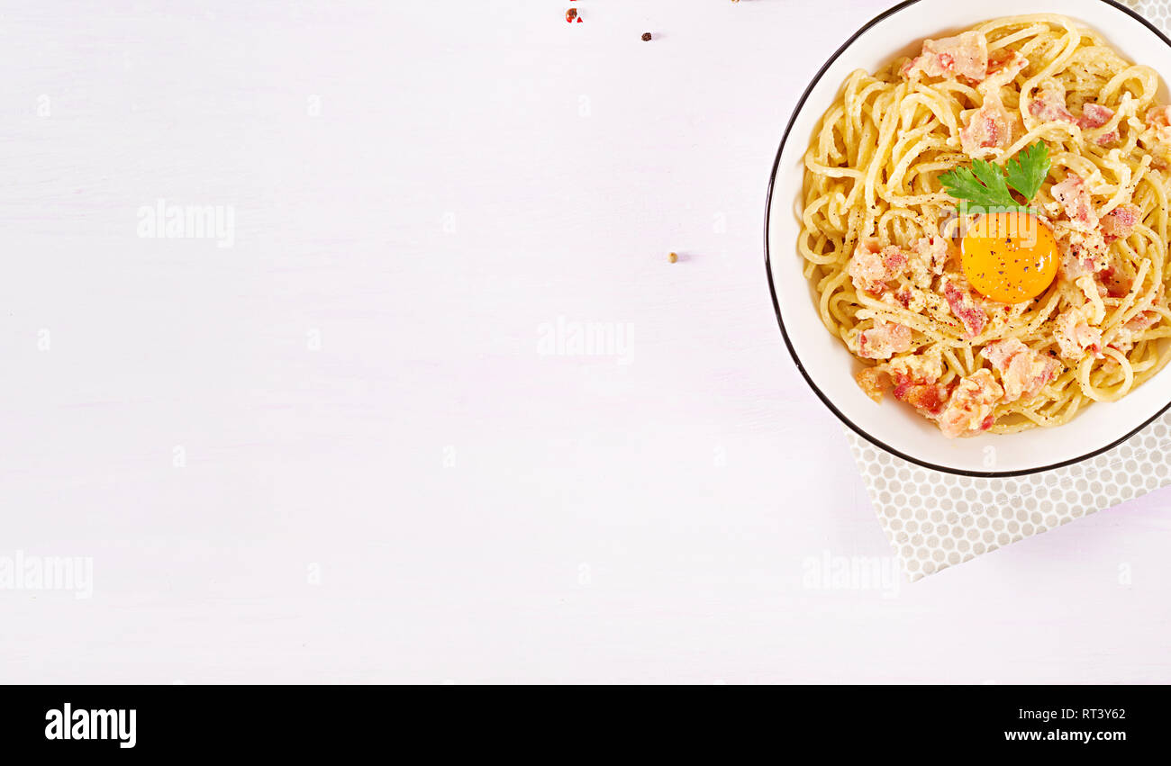 Classic homemade carbonara pasta with pancetta, egg, hard parmesan ...