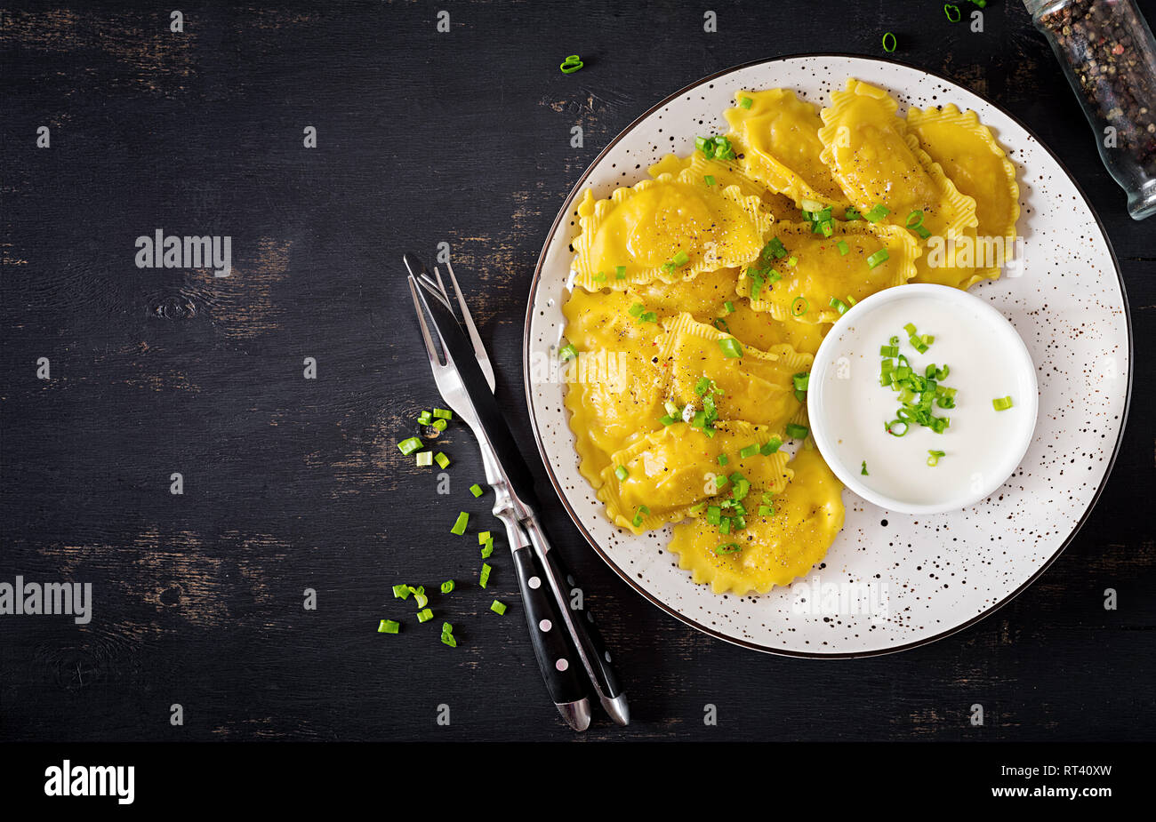 Ravioli with spinach and ricotta cheese. Italian cuisine. Top view ...