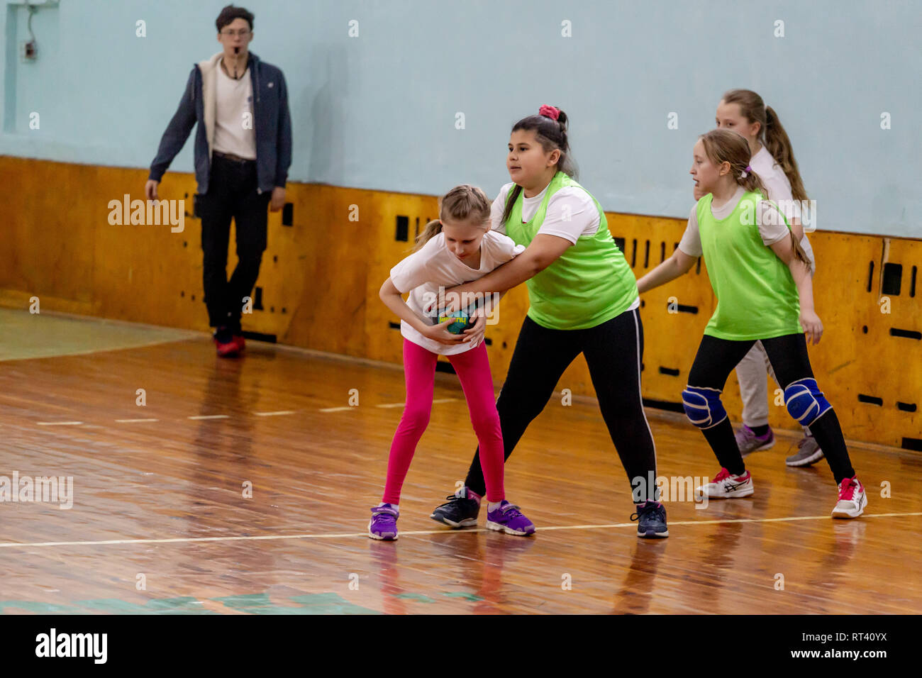 Russia, Vladivostok, 02/26/2019. Kids play handball indoor. Sports and ...