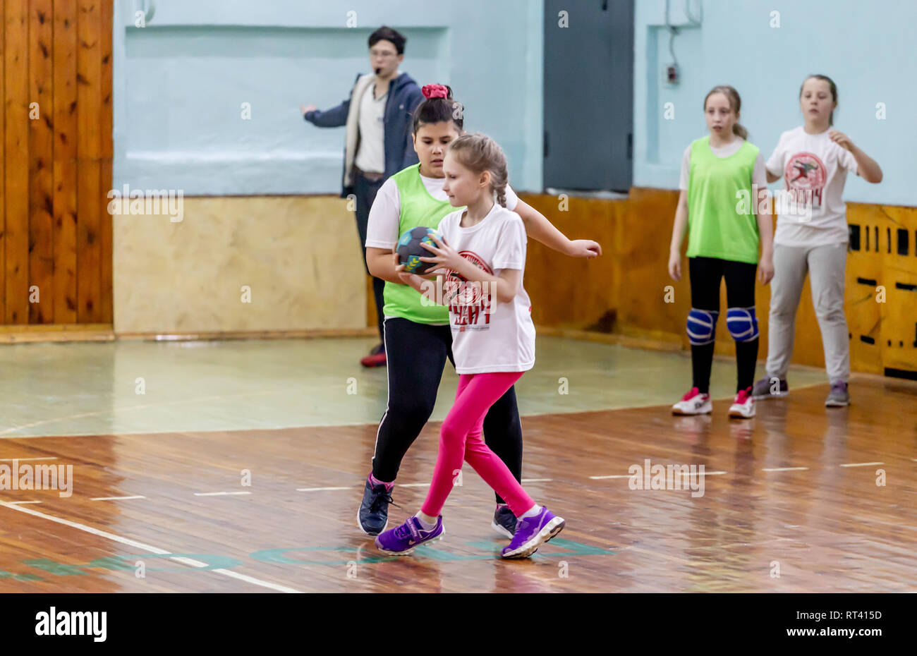 Russia, Vladivostok, 02/26/2019. Kids play handball indoor. Sports and ...