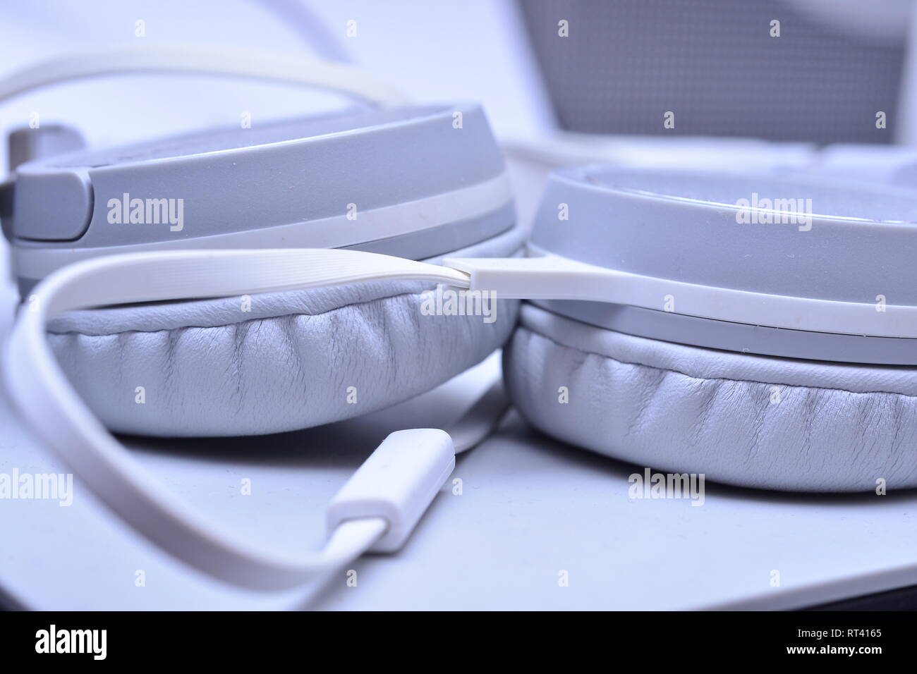 White headphones closeup Stock Photo - Alamy
