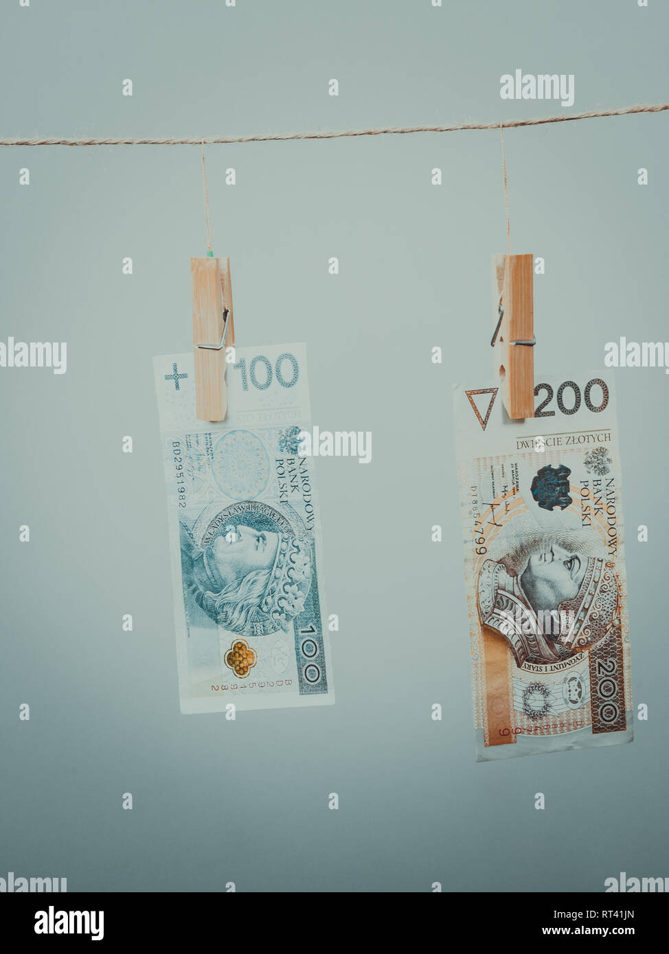 Banknotes cash money hang on laundry line on gray grey background Stock ...