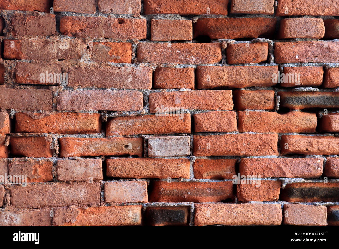 Weathered red bricks wall texture. Building stone surface background ...