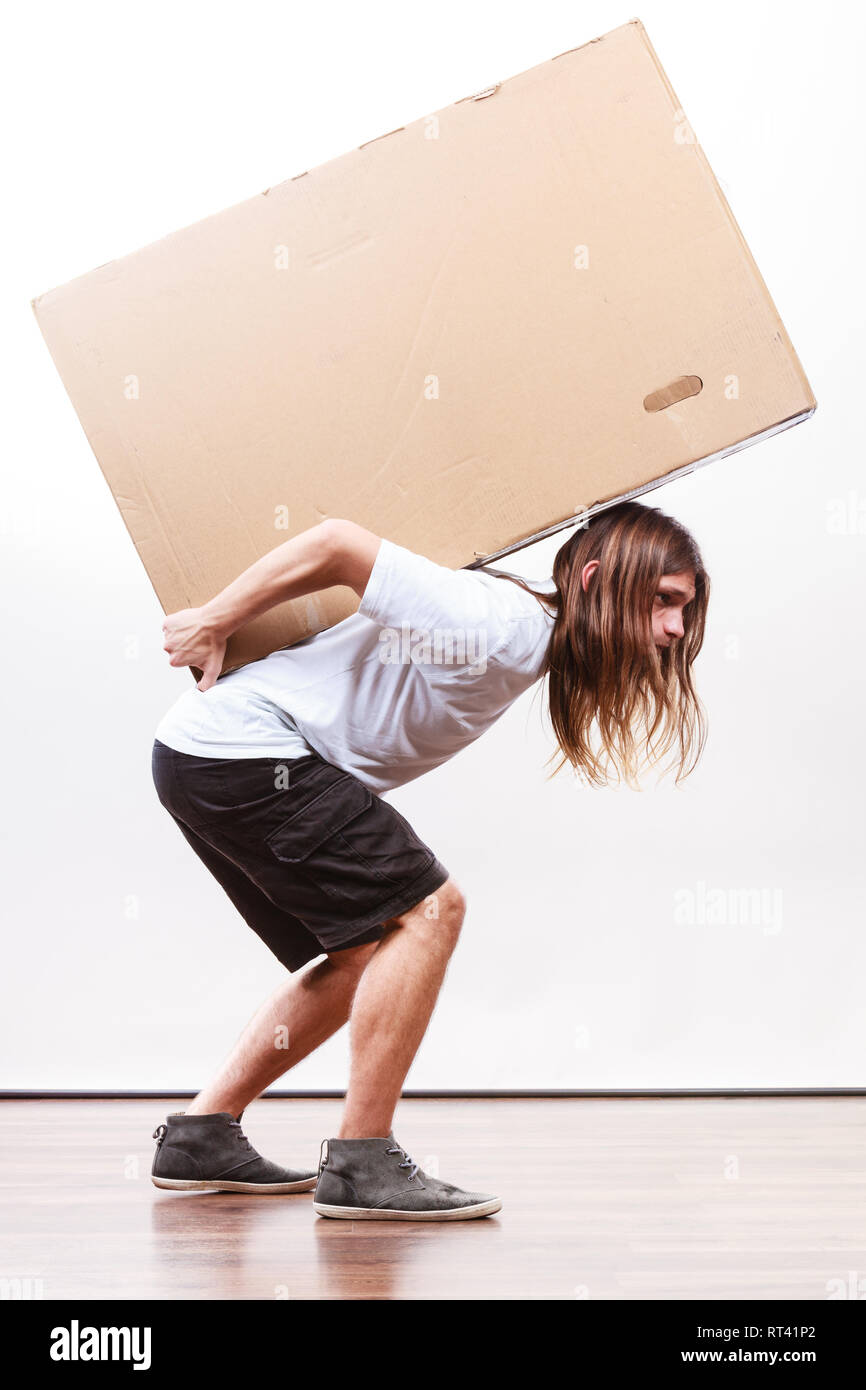 Removal service and delivery concept. Young male guy postal courier ...