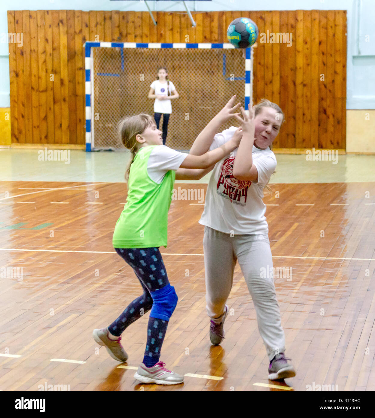 Russia, Vladivostok, 02/26/2019. Kids play handball indoor. Sports and ...