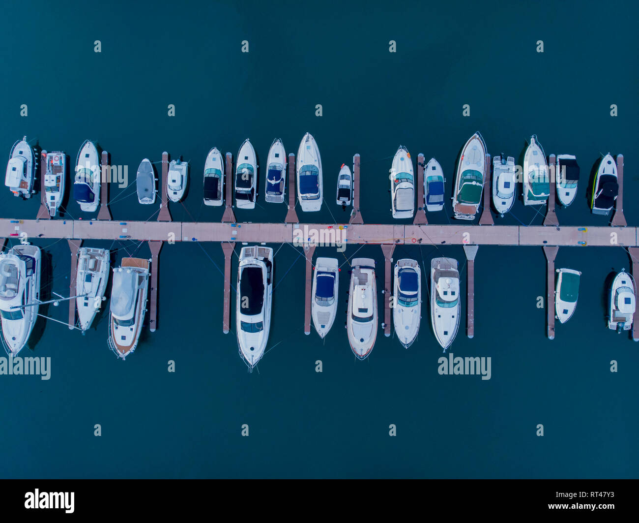 Aerial top down picture of marina a dock basin with moorings and ...