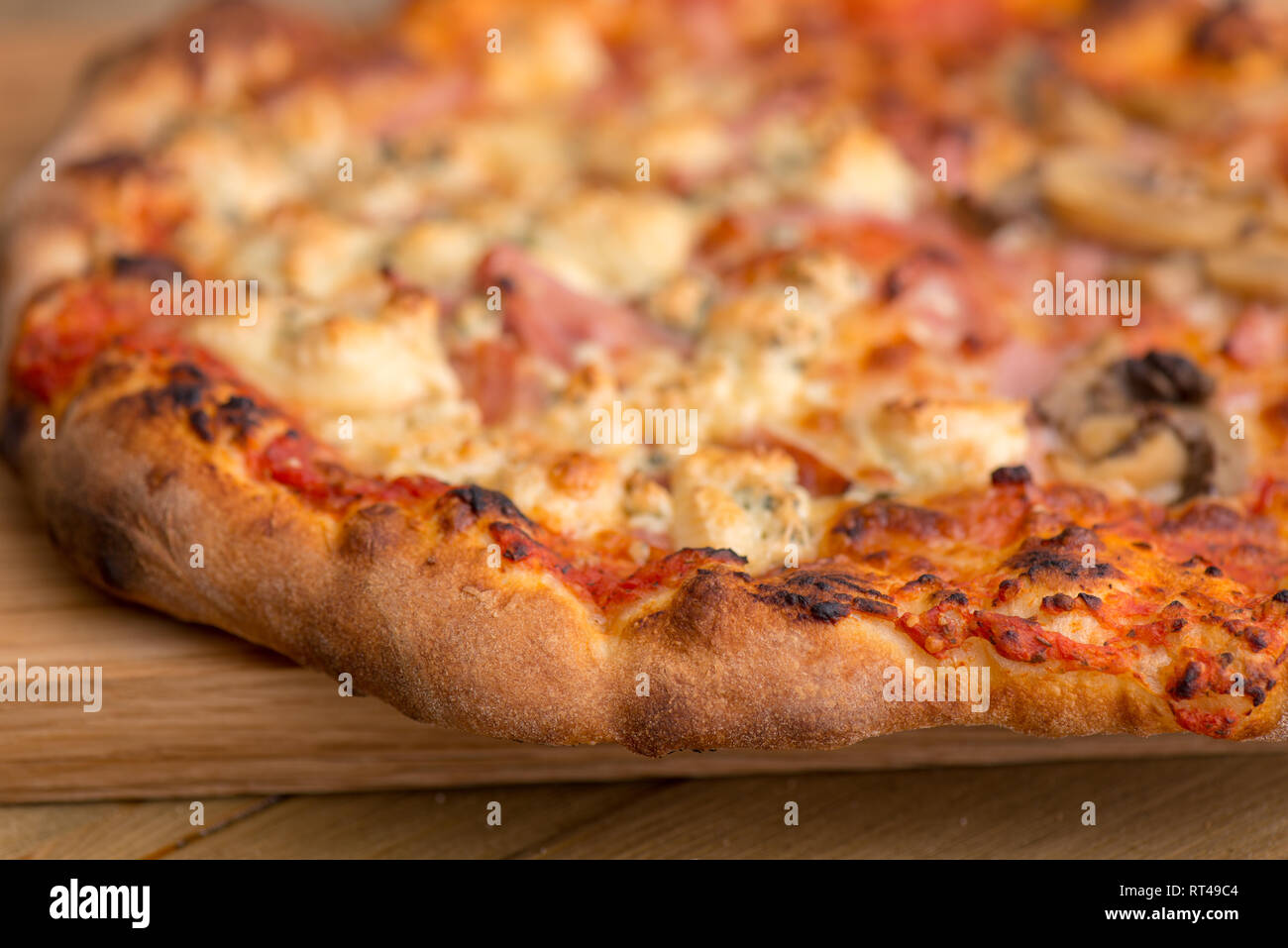 Premium pizza on a plate Stock Photo - Alamy