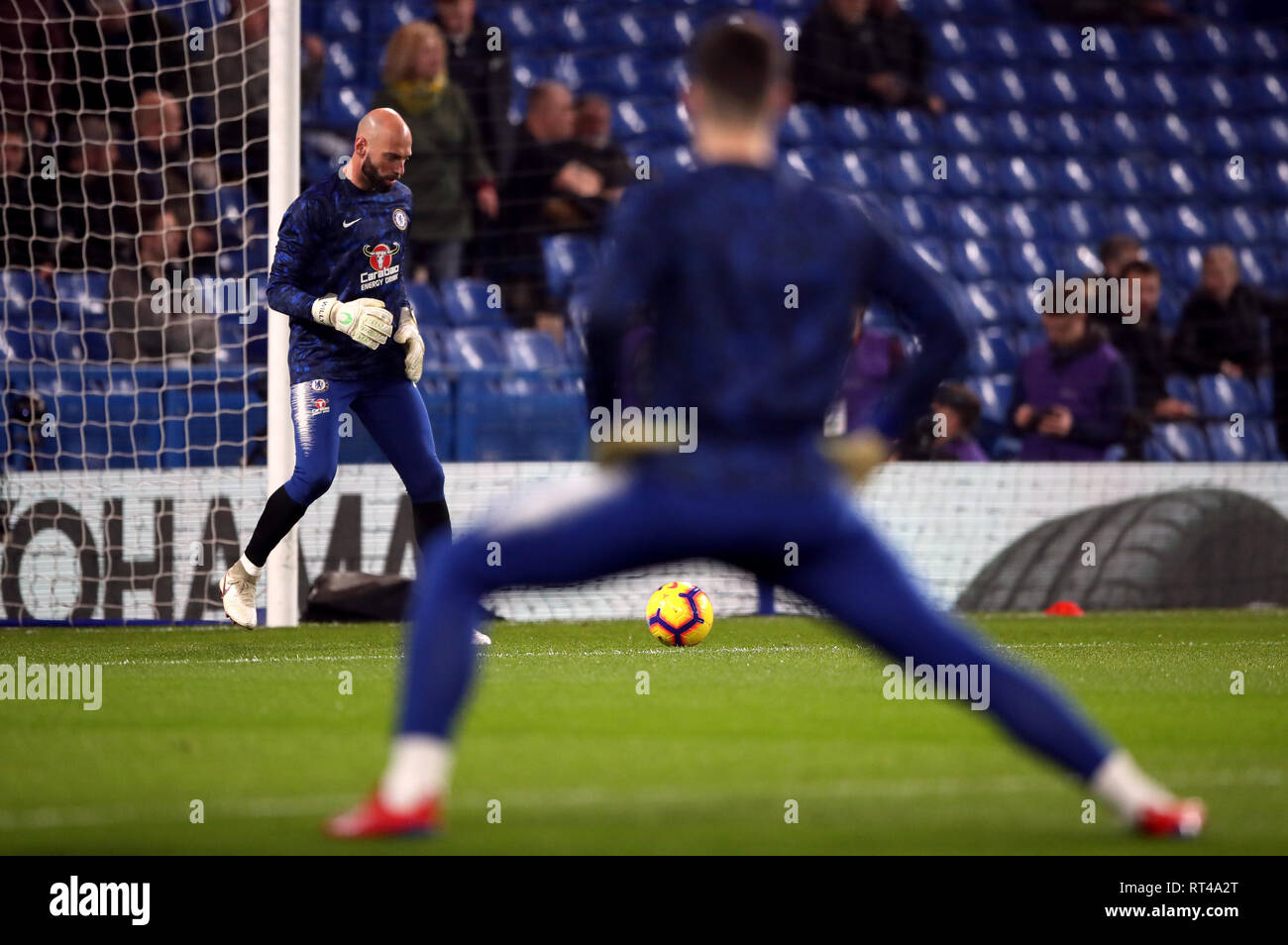Chelsea goalkeeper Kepa Arrizabalaga looks on at goalkeeper Willy ...