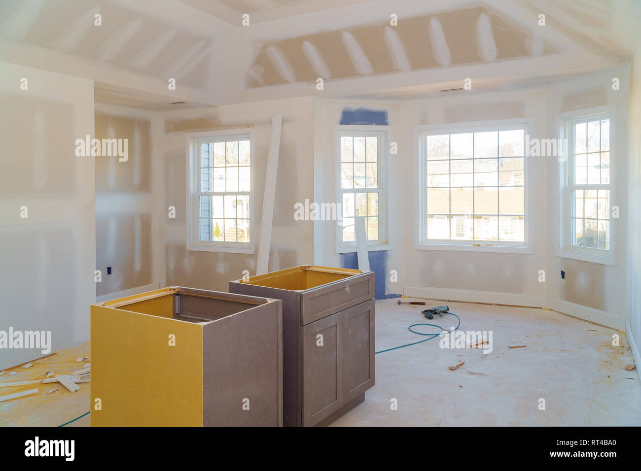 Finishing putty in the room drywalls with plasterboards at a ...