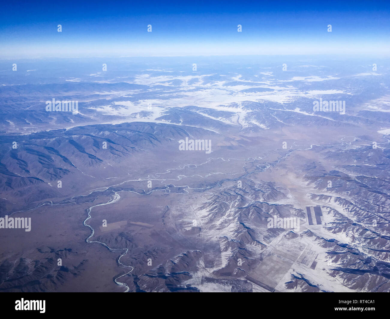 An aerial view of a part of Mongolia from the airplane flying high ...