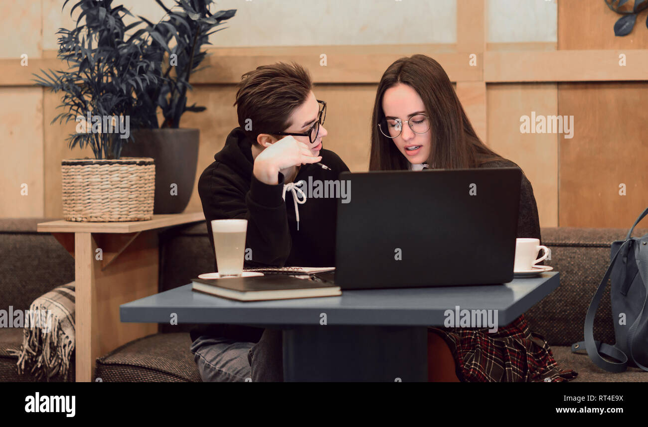 Teamwork in a friendly atmosphere hi-res stock photography and images ...