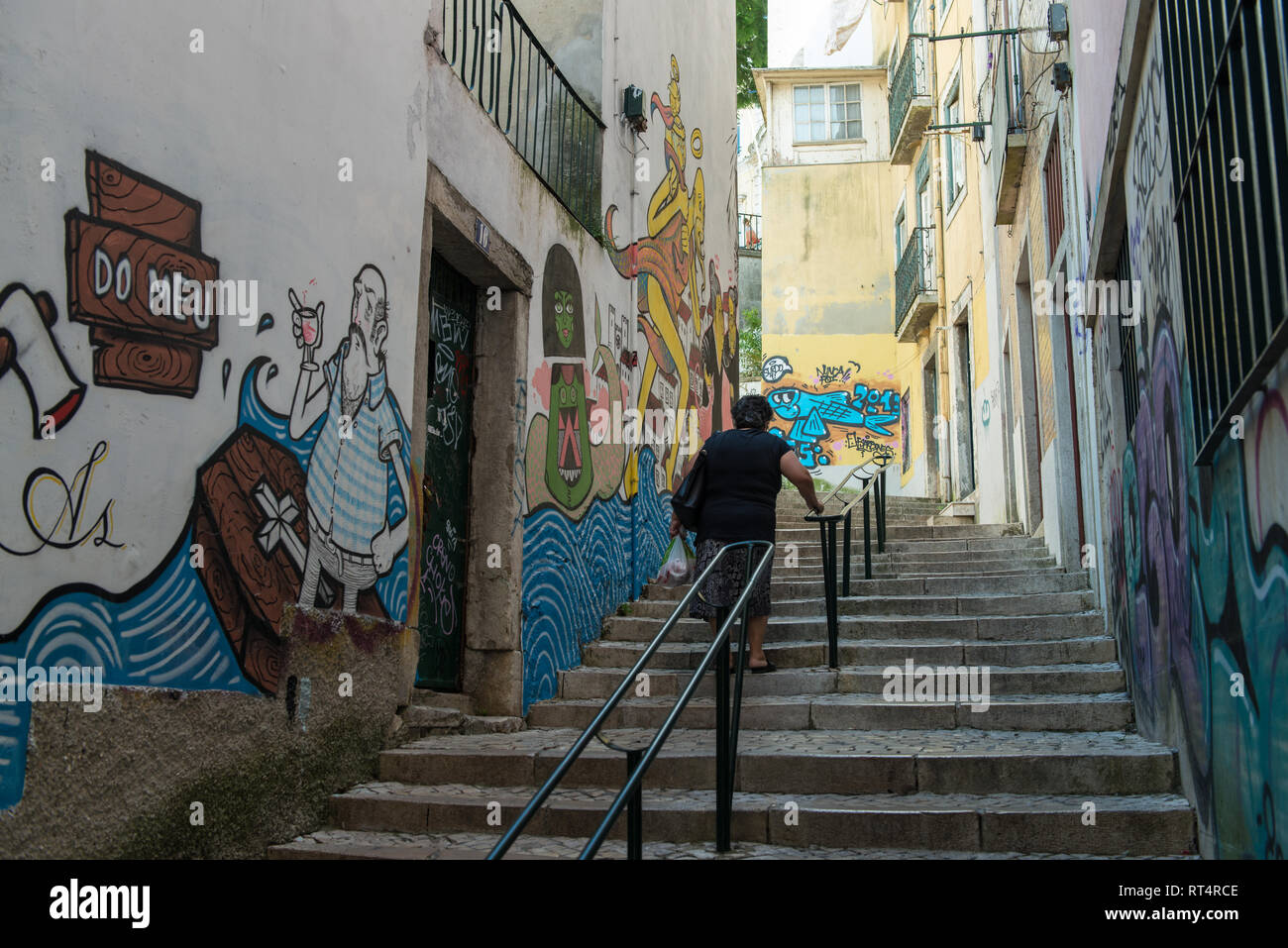 Graffiti and Street art in a street of Lisbon, Portugal Stock Photo - Alamy
