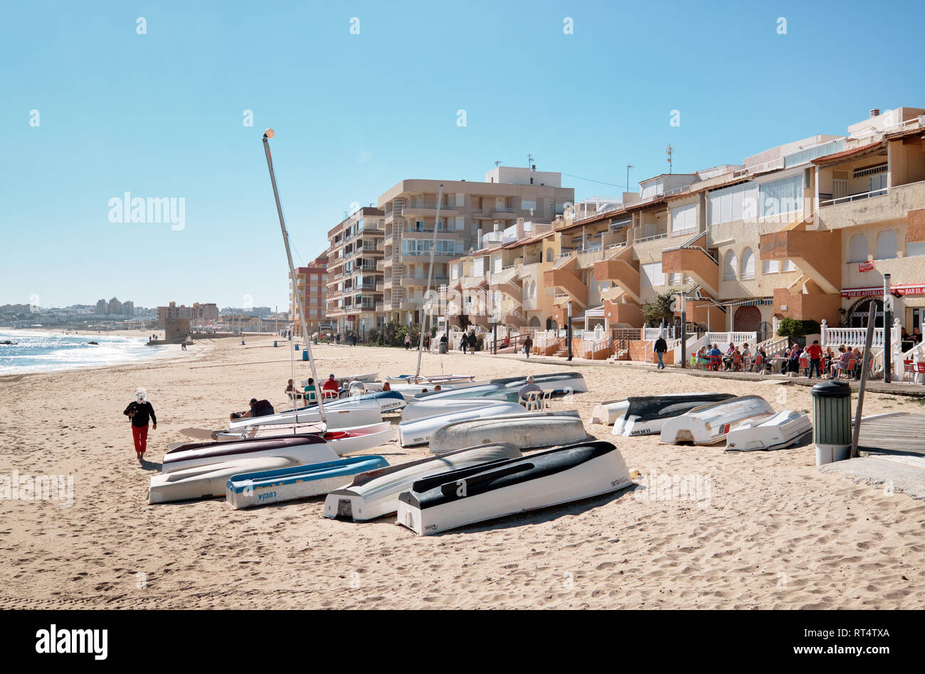 La Mata, Spain - February 5, 2019: Inverted fishing boats on the sandy ...