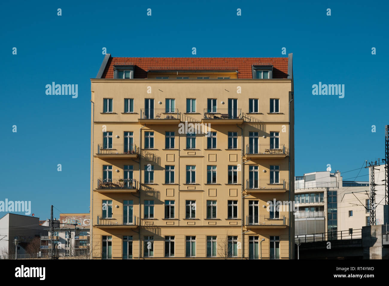 restored facade of typical old residential building in Berlin Stock ...