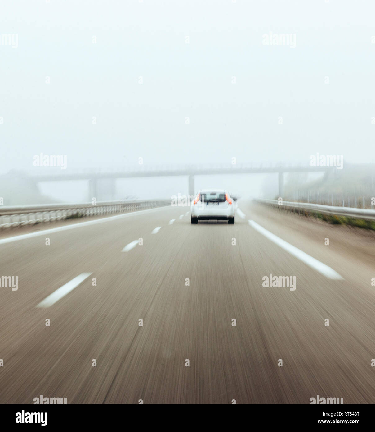FRANKFURT, GERMANY - NOV 23, 2017: Rear view of white car driving on ...
