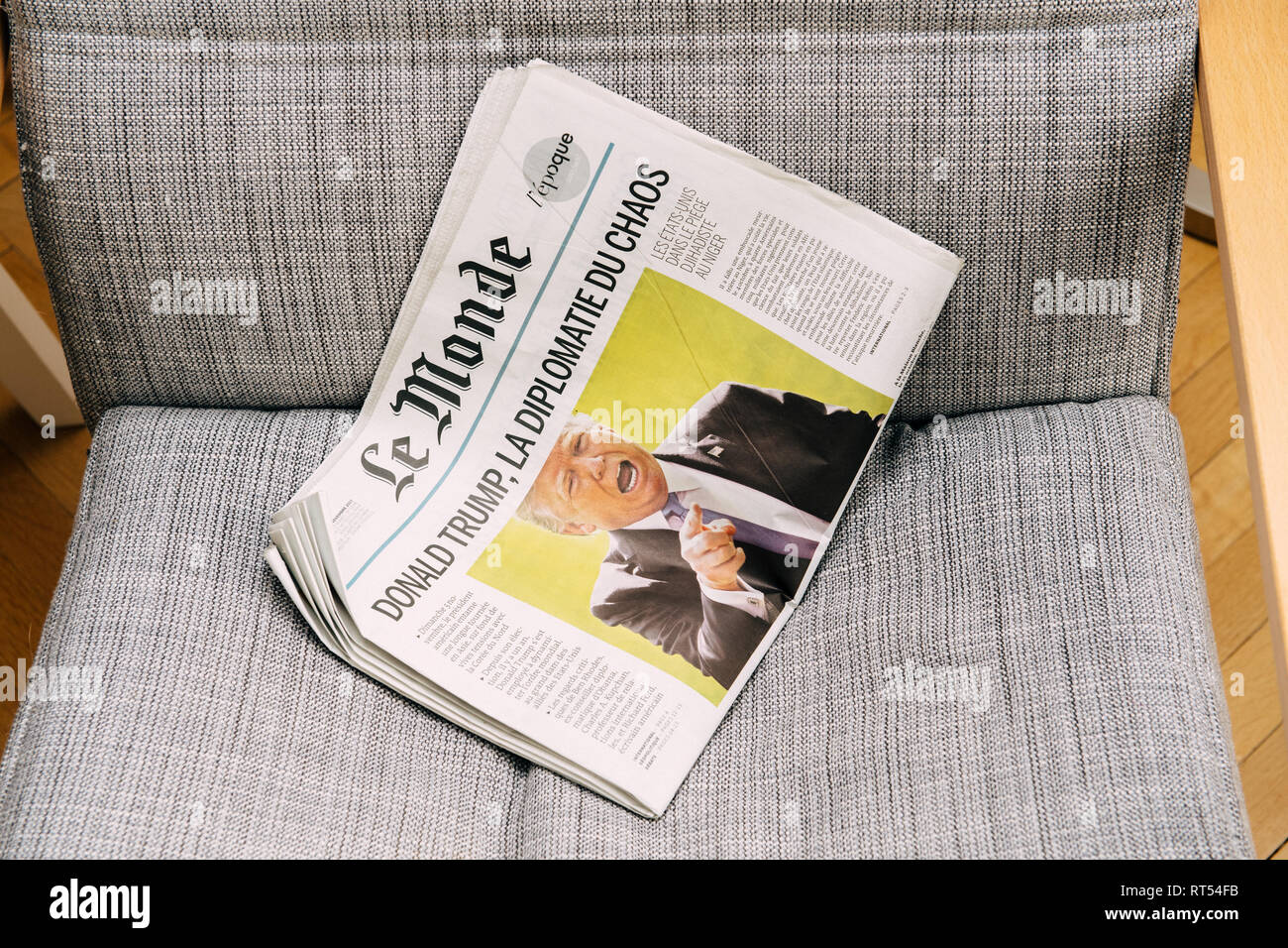 PARIS, FRANCE - NOV 6, 2017: Armchair background latest Le Monde ...