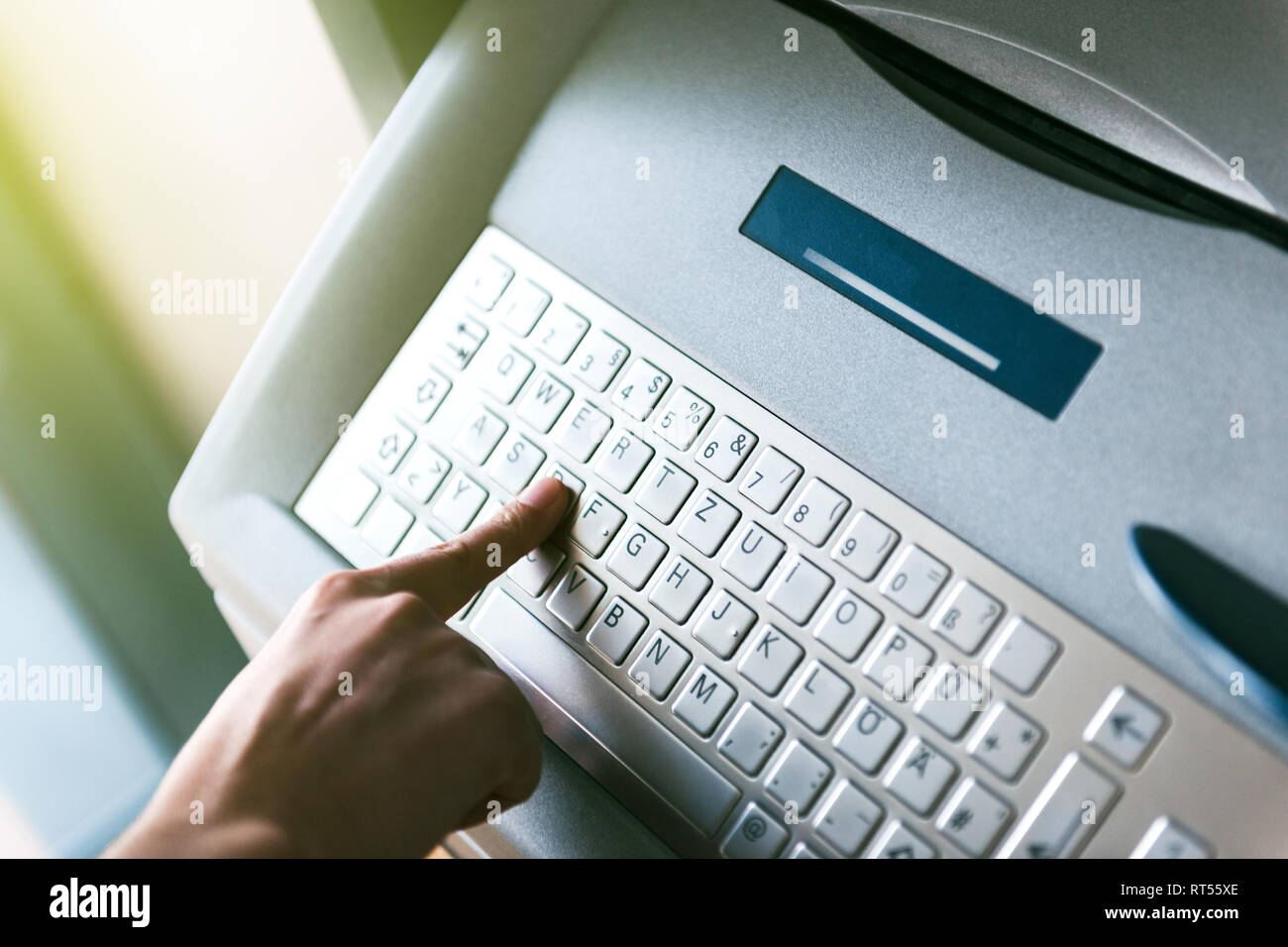 Modern filter over woman finger pressing the D letter button on the ...