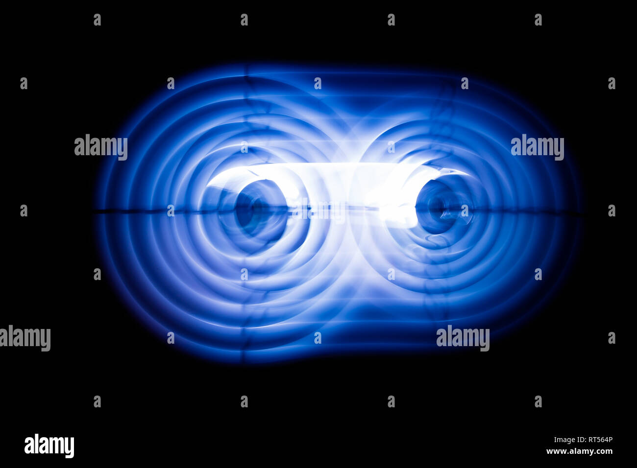 Sound waves in the visible blue color in the dark Stock Photo - Alamy