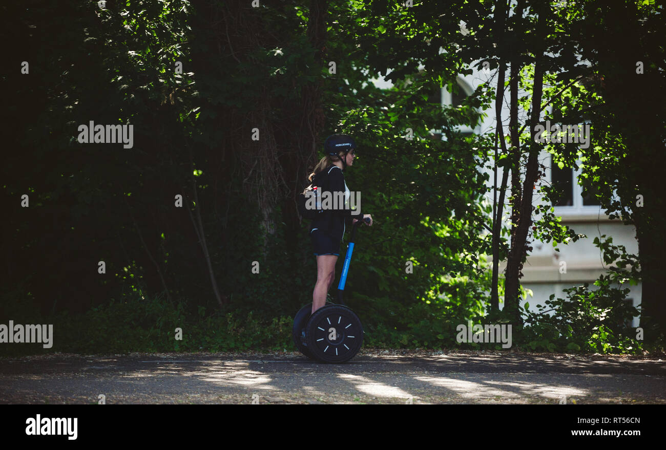 PARIS, FRANCE - JUN 3, 2016: Beautiful Fit woman on Segway discovering ...
