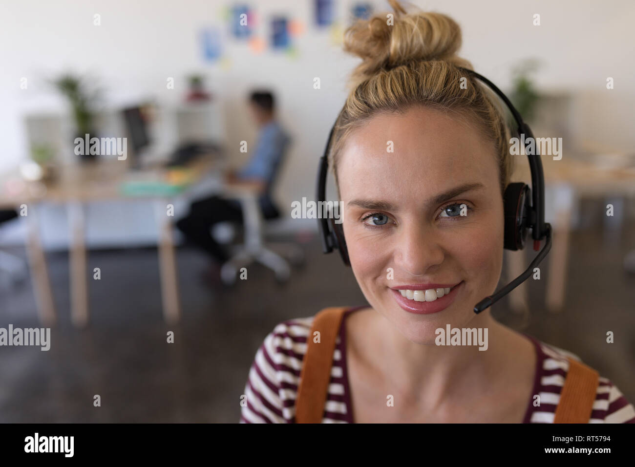Female executive sitting desk using hi-res stock photography and images ...