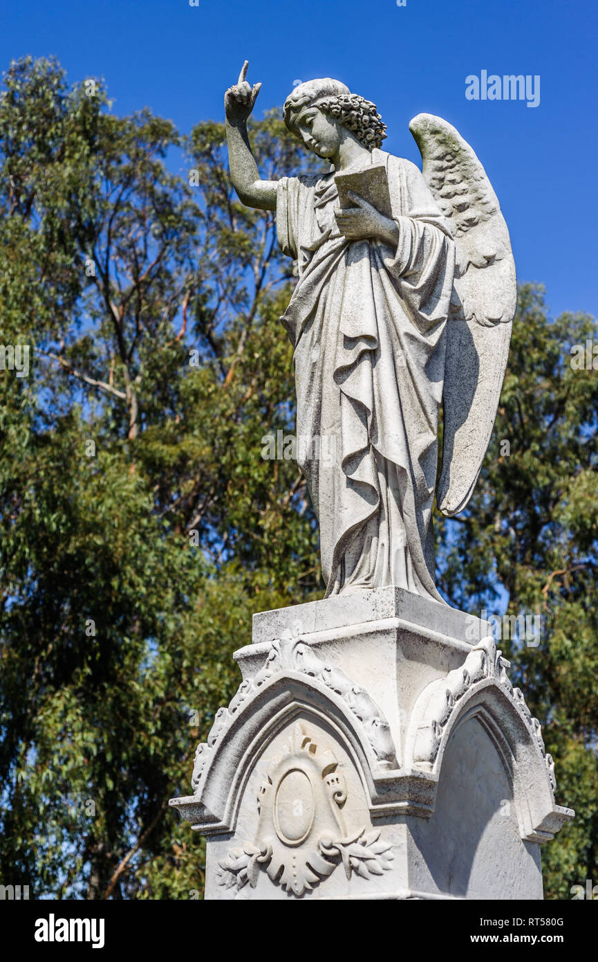 A stone angel grave monument at Saint Mary's Cemetery in Oakland ...