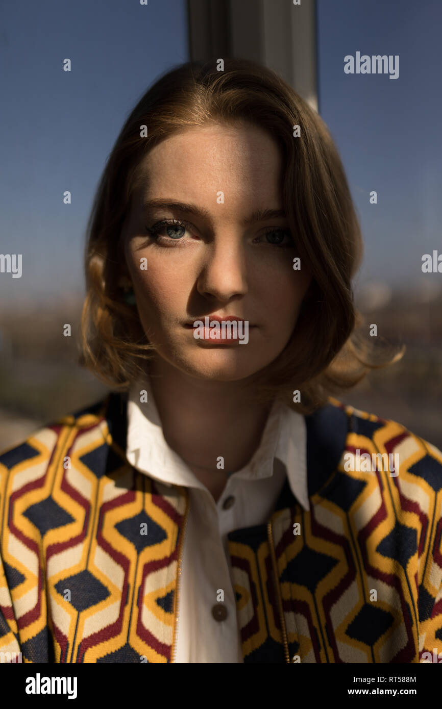 Female executive standing in office Stock Photo - Alamy