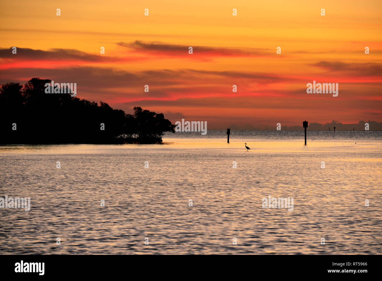 Sun rising over Cow Key Channel in Key West Stock Photo - Alamy