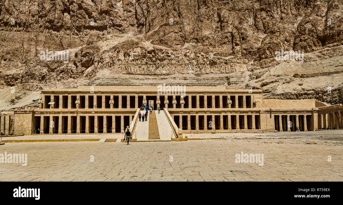 The Temple of Deir el-Bahri is situated at the base of the sheer cliffs ...
