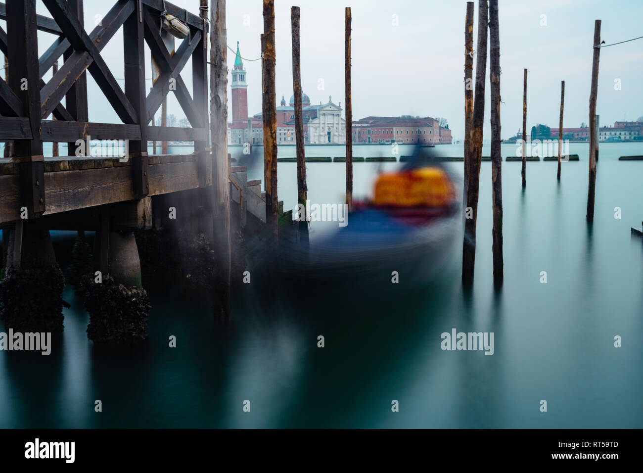 Gondola at the dock in a long exposure Stock Photo - Alamy