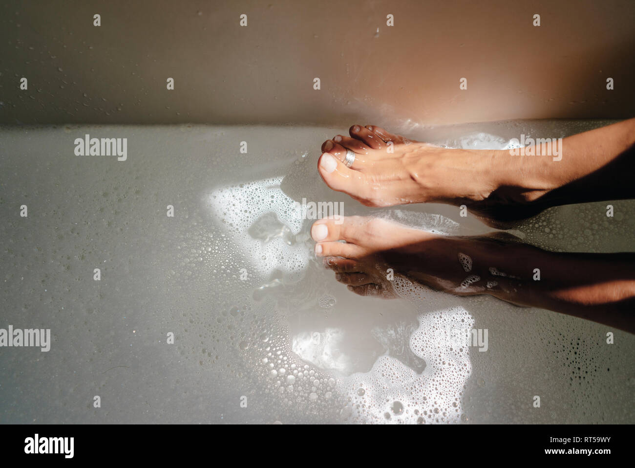 Woman taking footbath, partial view Stock Photo - Alamy Woman taking footbath, partial view Stock Photo - Alamy