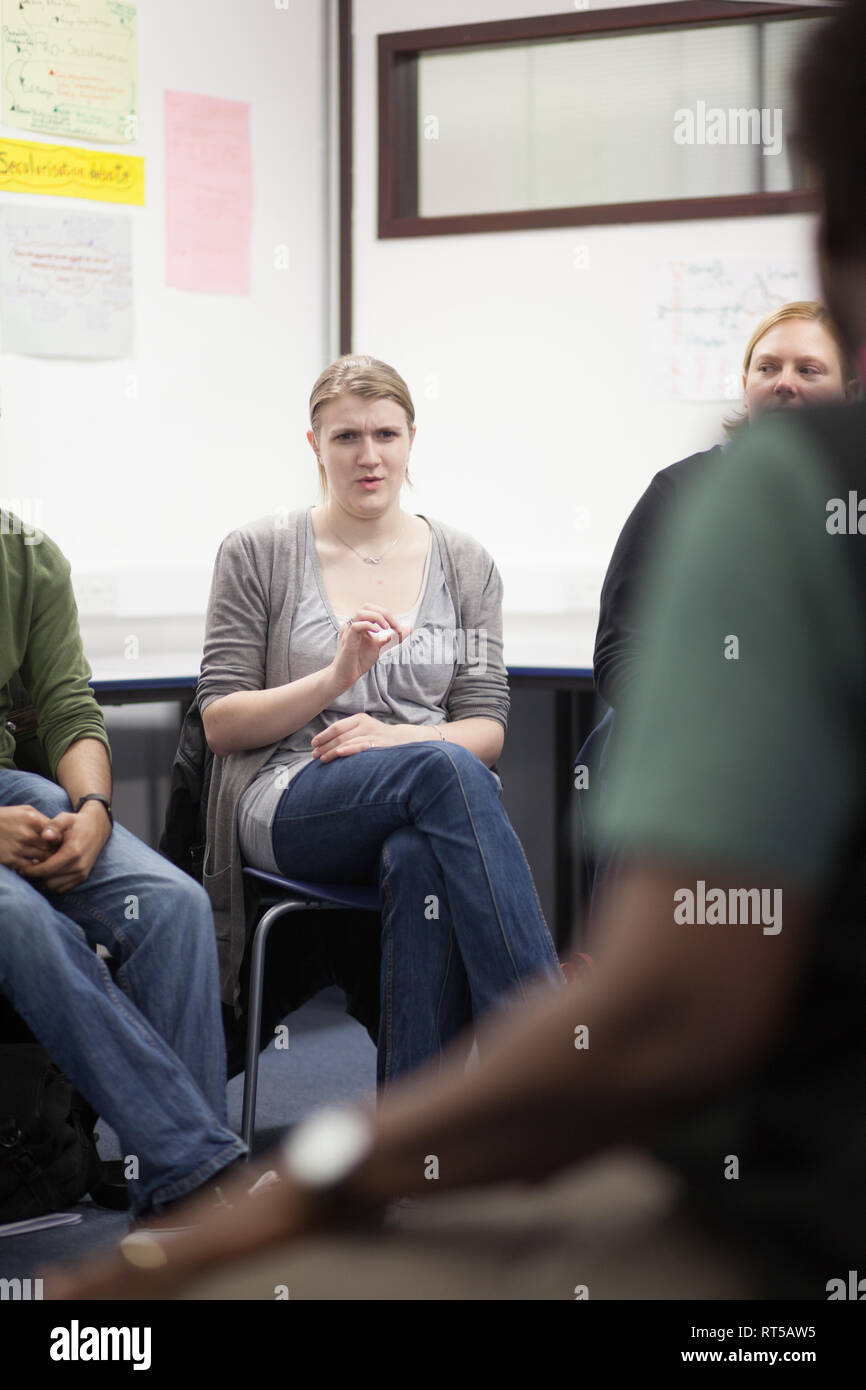 adults in a further education college learning how to use sign language ...