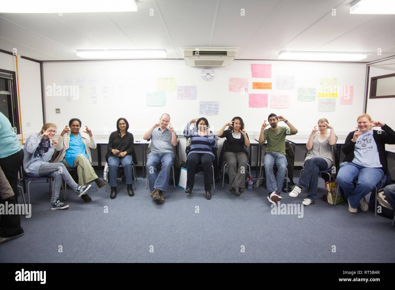 adults in a further education college learning how to use sign language ...