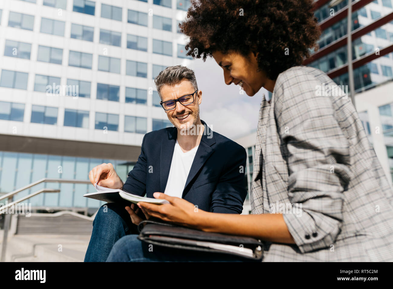 Working together outside hi-res stock photography and images - Alamy