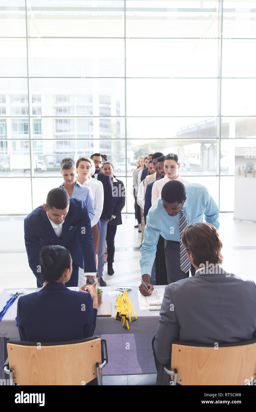 Conference registration table hi-res stock photography and images - Alamy